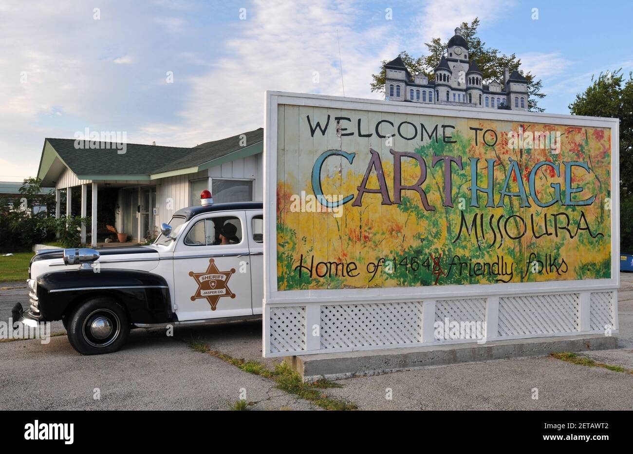 Police car behind billboard hi-res stock photography and images - Alamy