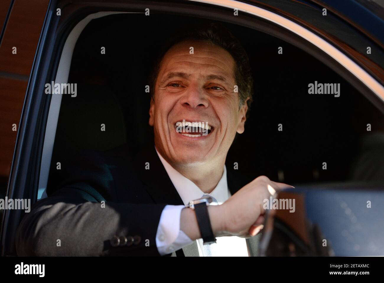 New York State Governor Andrew Cuomo smiles as he prepares to leave the ...