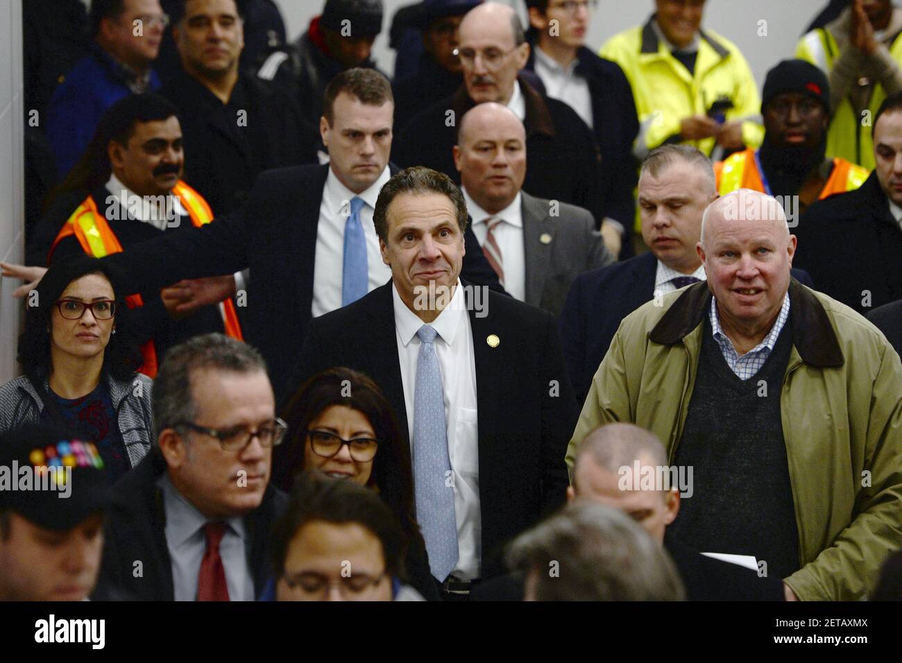 New York State Governor Andrew Cuomo (center) and Thomas Predergrast (r ...