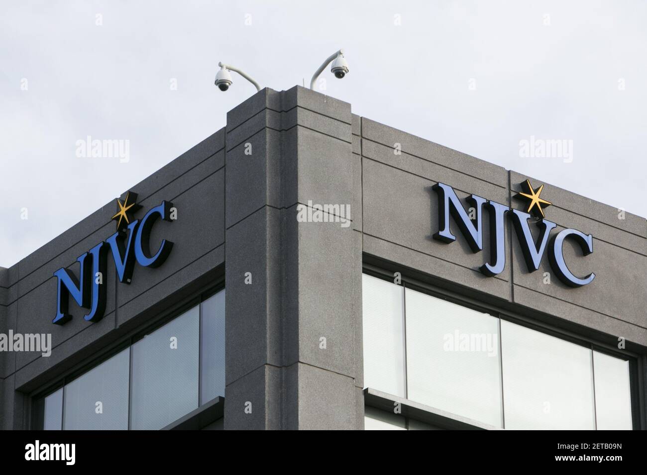A logo sign outside of the headquarters of NJVC in Chantilly, Virginia ...