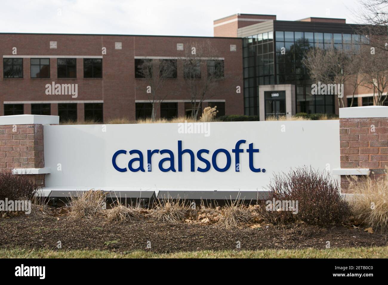 A logo sign outside of the headquarters of the Carahsoft Technology ...