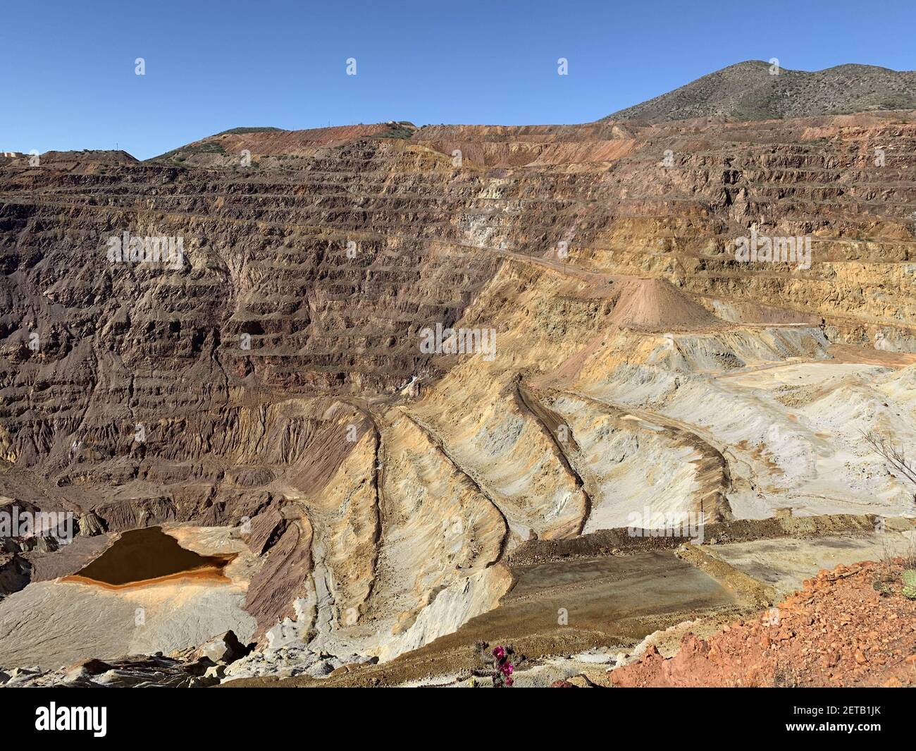 A beautiful view of the rock layers cut away at a huge mine near Bisbee ...