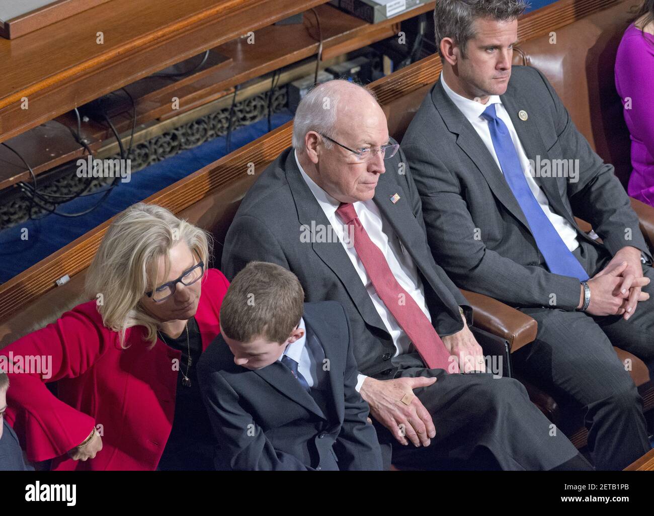 Former United States Vice President Dick Cheney, center, sits with his ...