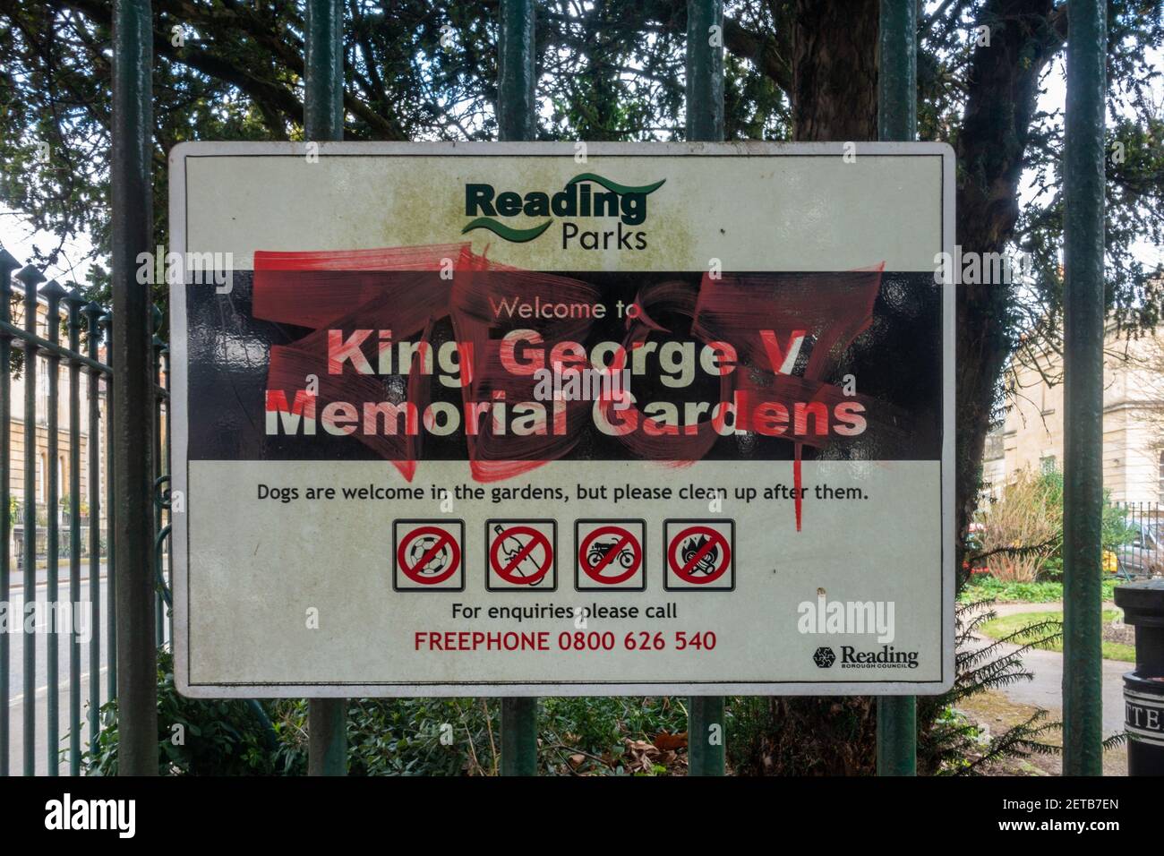 A sign attached to railings on the entrance to King George V Memorial ...