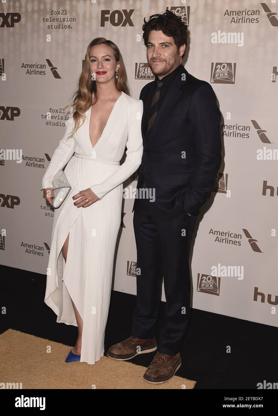 BEVERLY HILLS, CA - JANUARY 8: Leighton Meester and Adam Pally at the ...