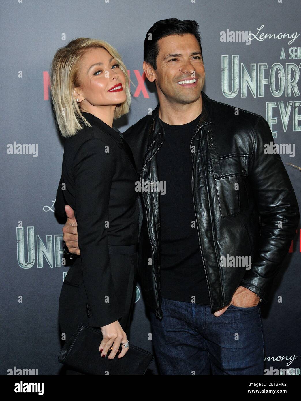 TV journalists Kelly Ripa and Mark Consuelos attend the world premiere ...