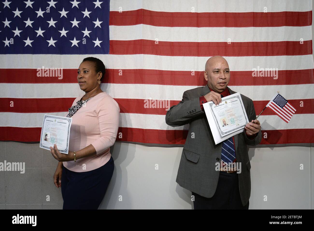 (L-R) Newly sworn in United States Citizens Maria Nicolas from Haiti ...