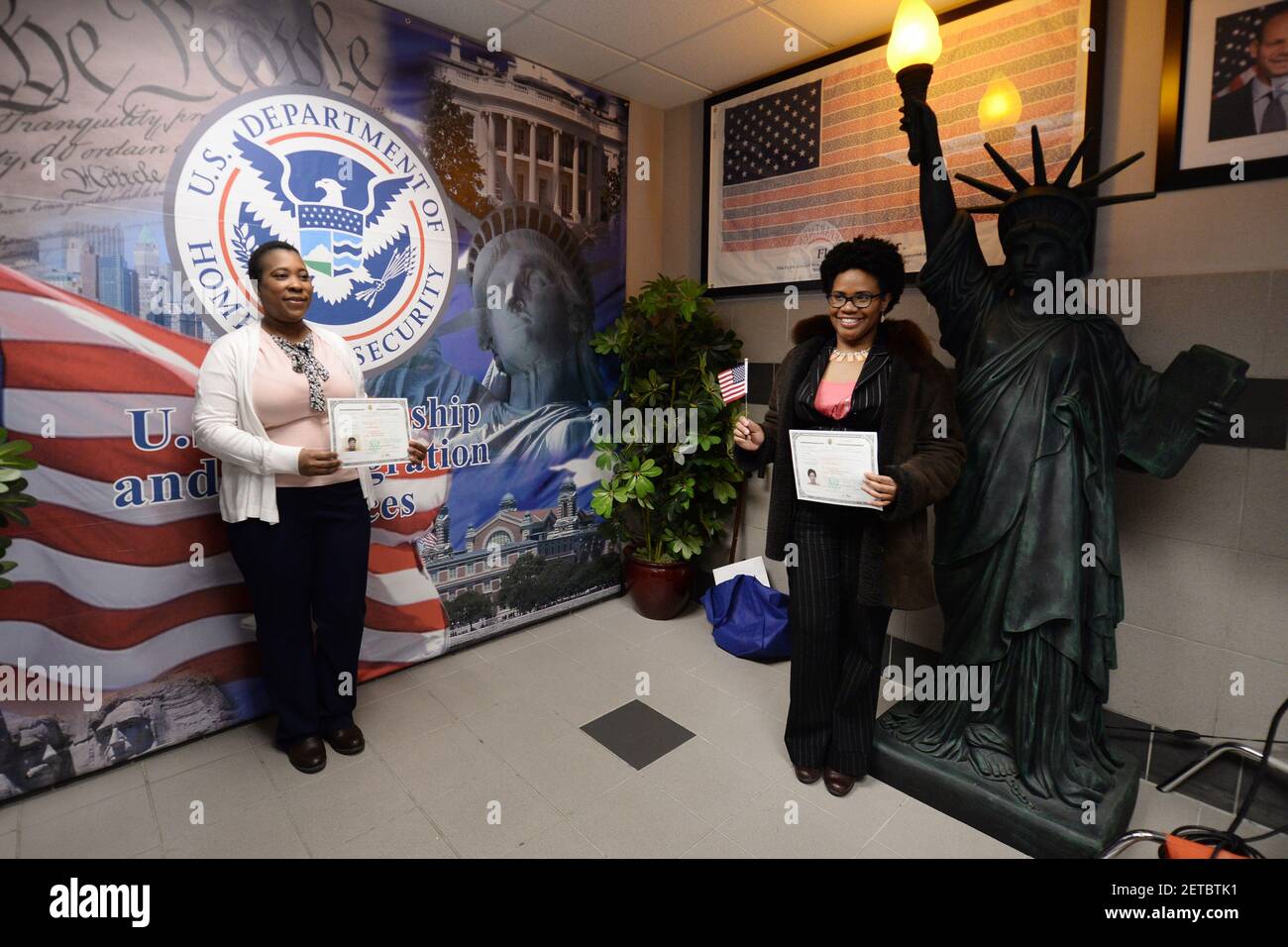 (L-R) Newly sworn in United States Citizens Maria Nicolas from Haiti ...