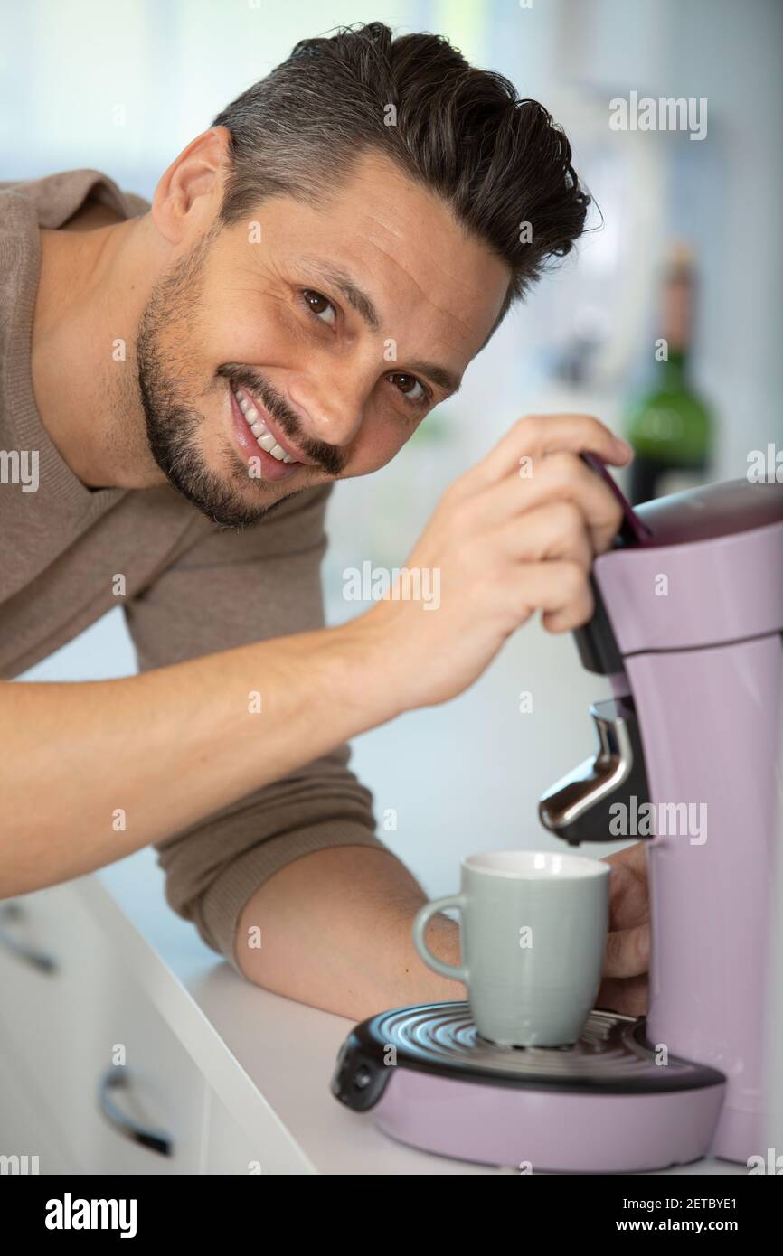 Partial man making traditional coffee hi-res stock photography and ...