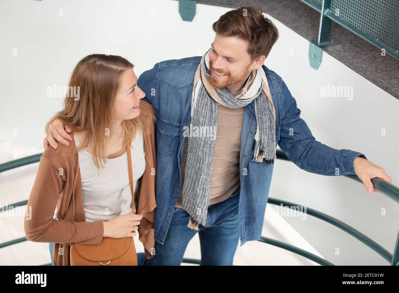 couple arriving at home together Stock Photo - Alamy