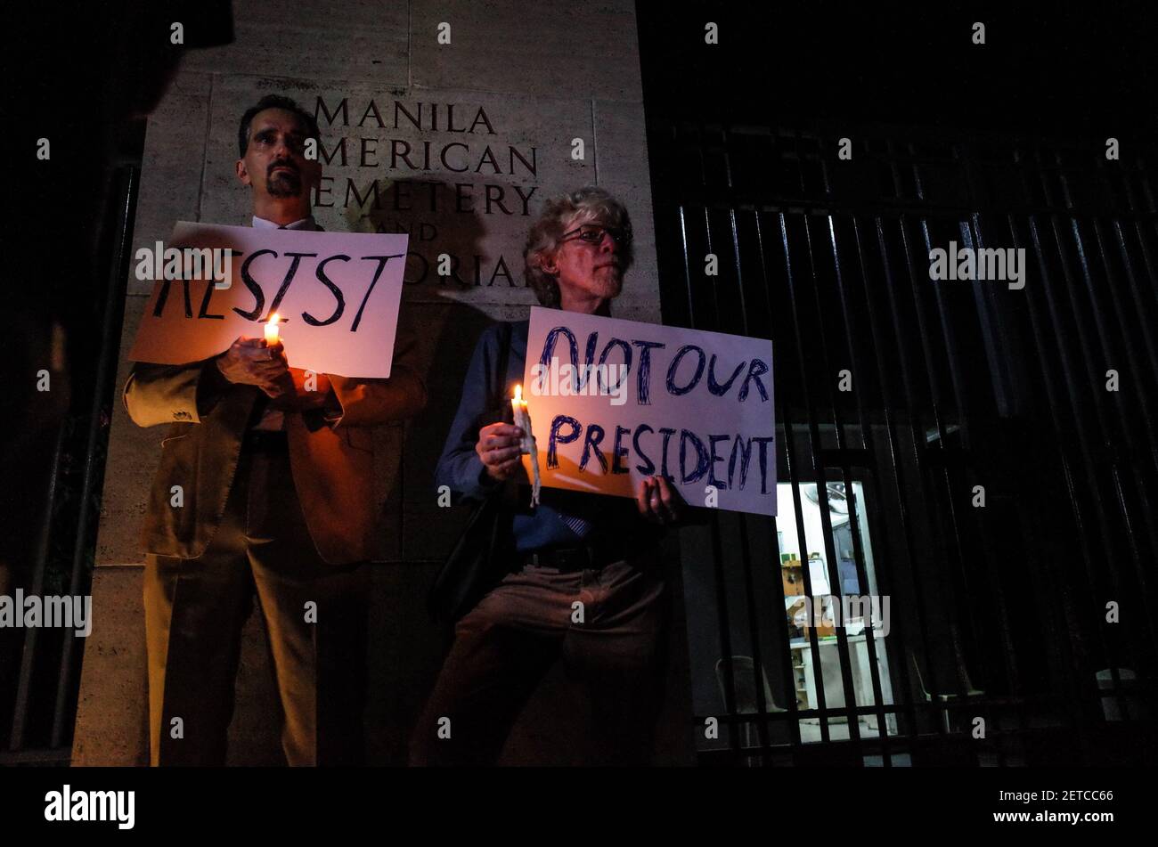 Philippine-based Tim Ortiz, and Donald Goertzen protests against ...