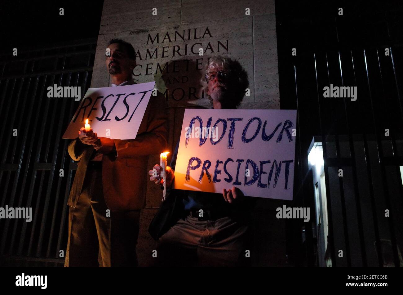 Philippine-based Tim Ortiz, and Donald Goertzen protests against ...