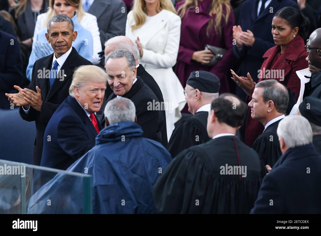 President Barack Obama and Michelle Obama watch as President Donald ...