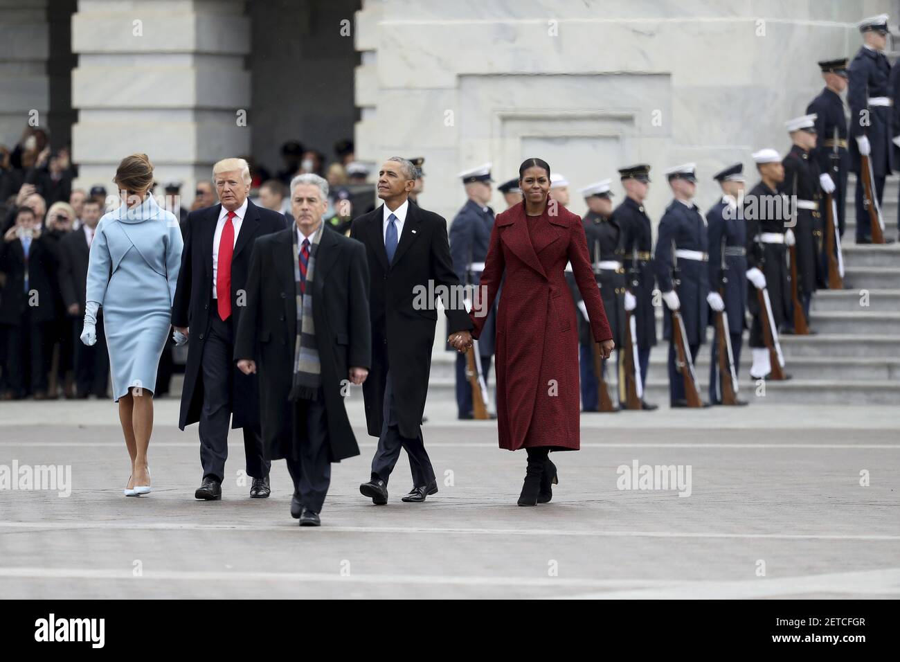 President Donald Trump and first lady Melania Trump walks with former ...
