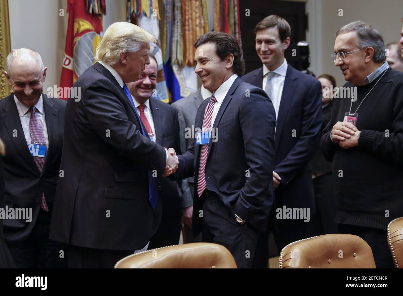 US President Donald Trump (L), with CEO of Fiat Chrysler Automobiles ...