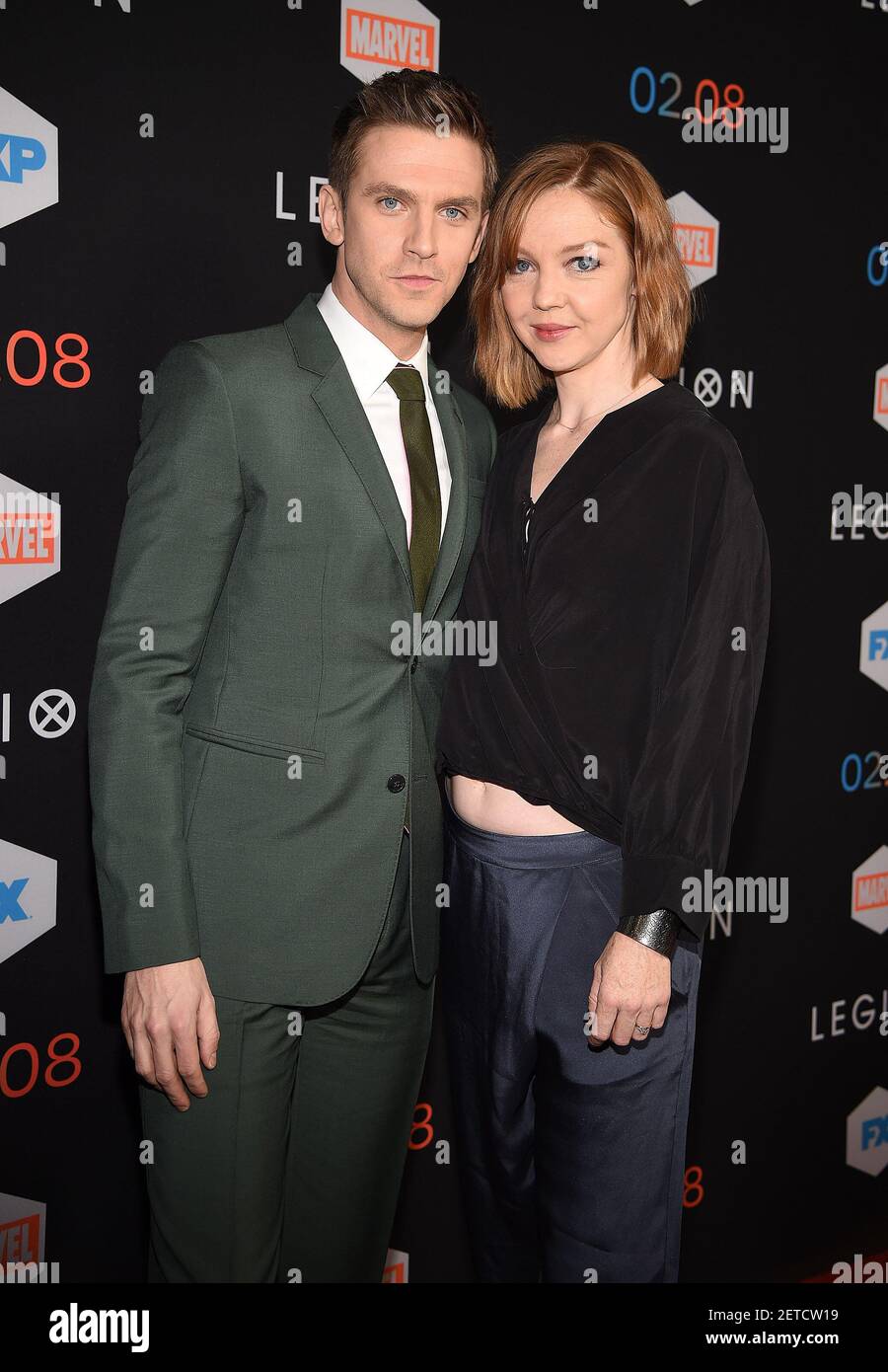 WEST HOLLYWOOD, CA - JANUARY 26: Dan Stevens (L) and wife Susie Hariet ...