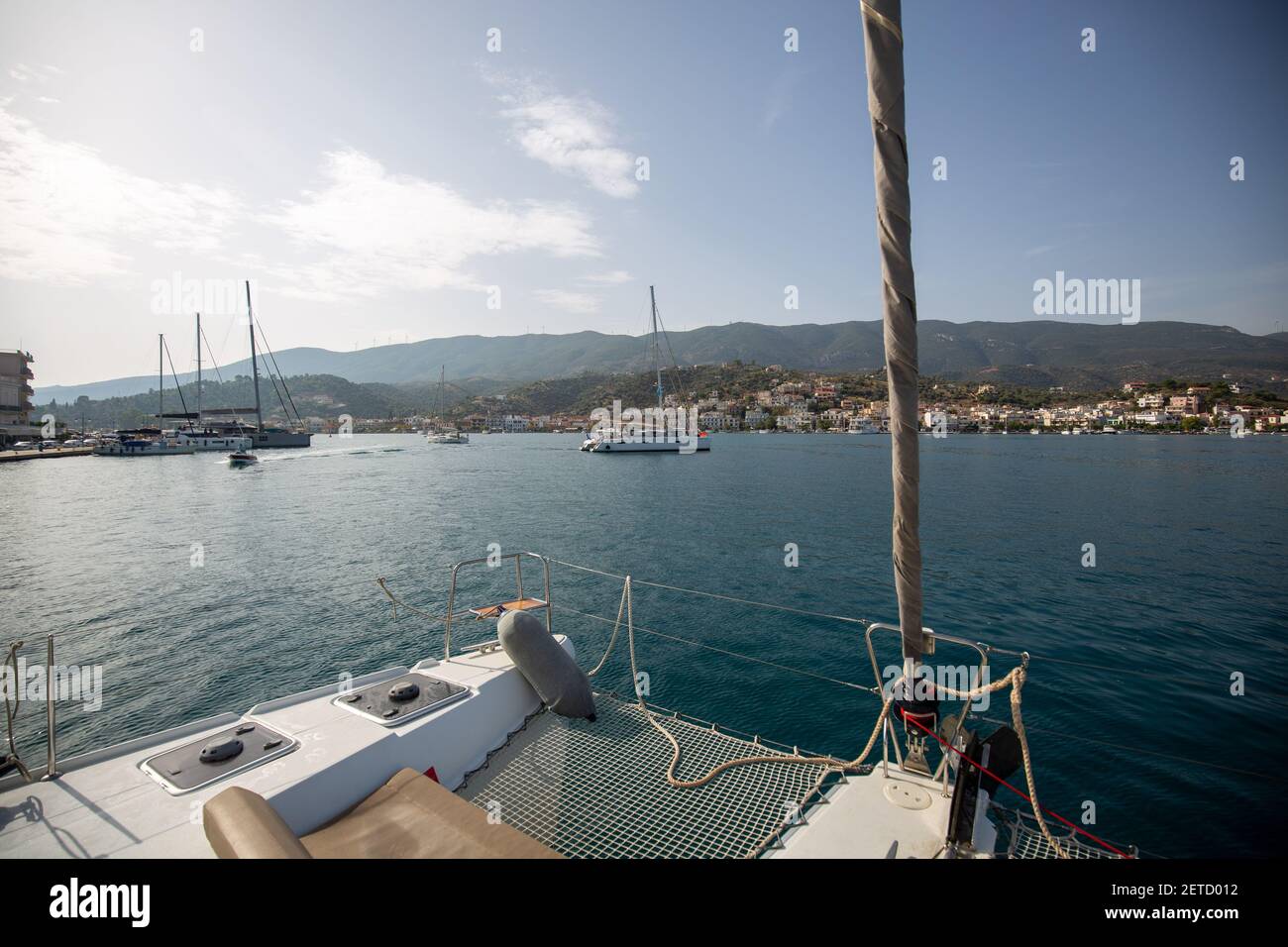A beautiful shot of Hydra island village in Greece seen from a yacht ...