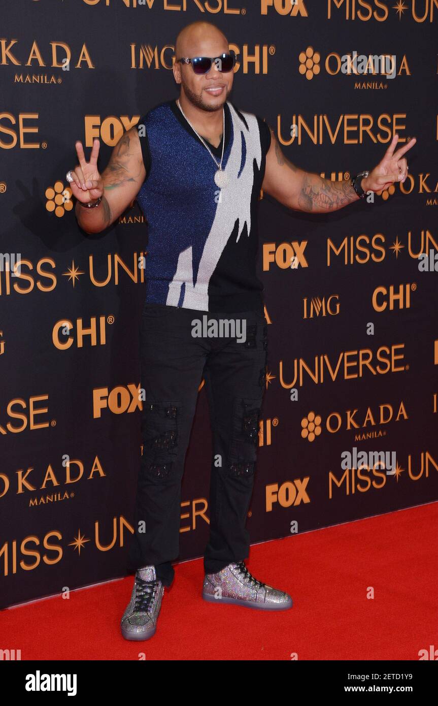 Flo Rida arrives at the 65th Miss Universe Red Carpet held at the SMX ...