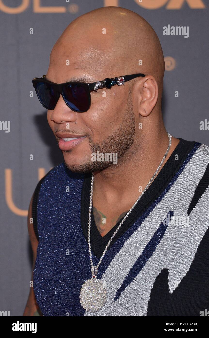 Flo Rida arrives at the 65th Miss Universe Red Carpet held at the SMX ...