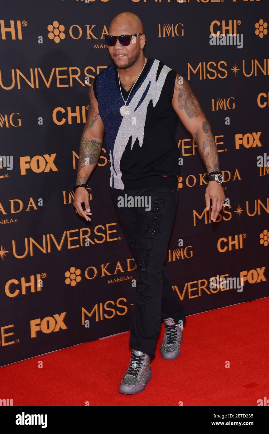 Flo Rida arrives at the 65th Miss Universe Red Carpet held at the SMX ...