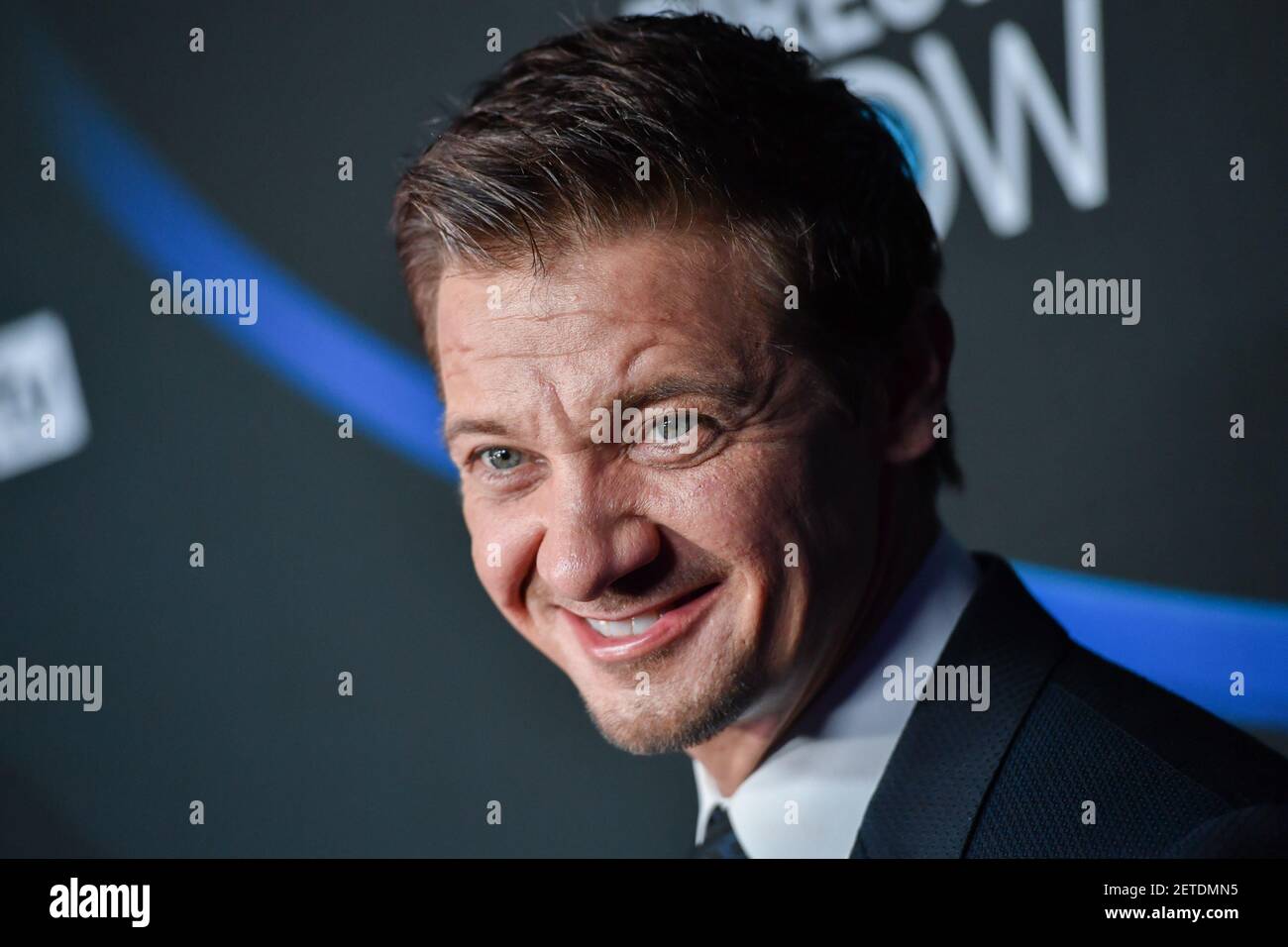 Jeremy Renner arriving on the red carpet for the AT&T presents DIRECTV ...