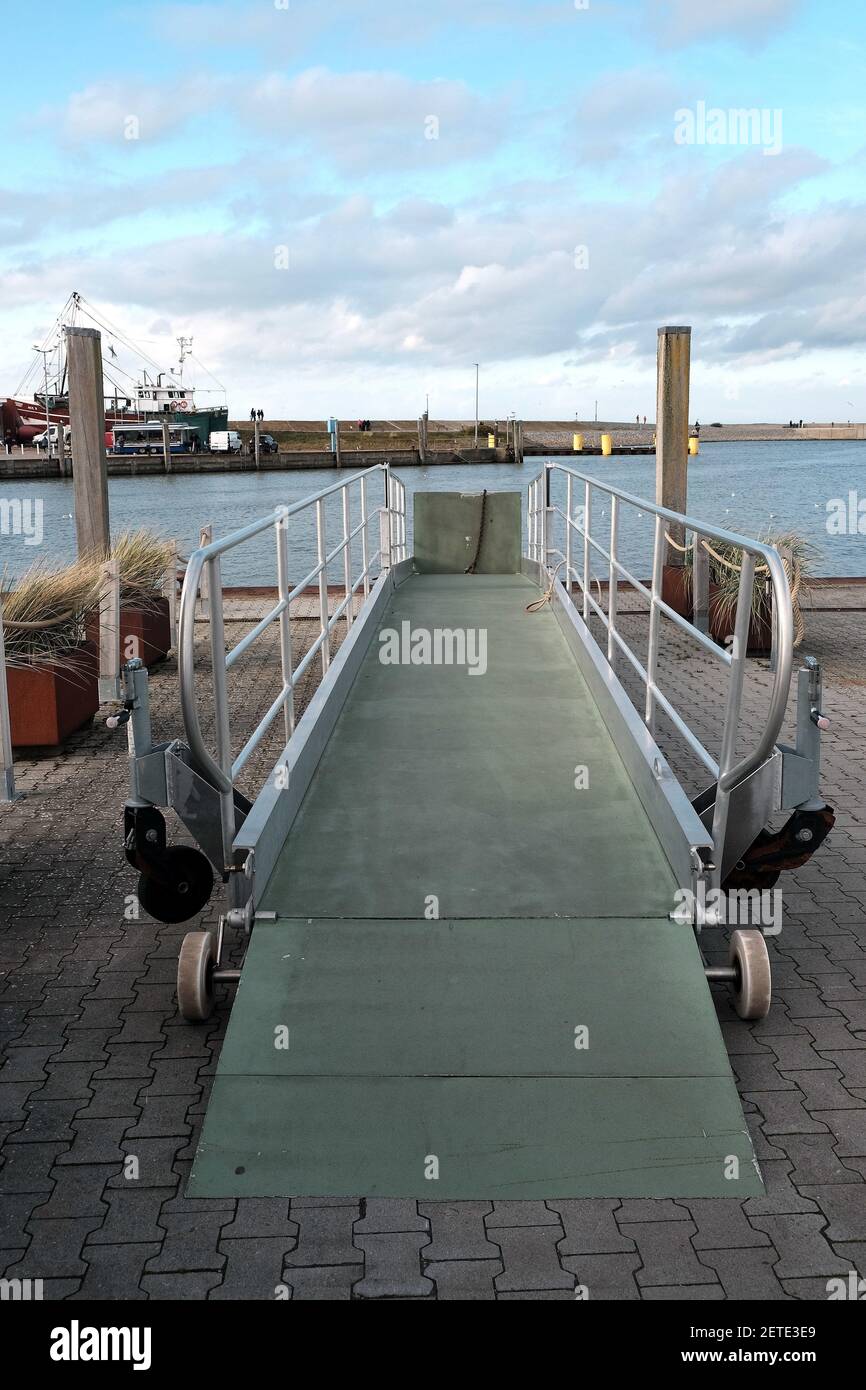 A boarding entrance platform at the seaport Stock Photo - Alamy