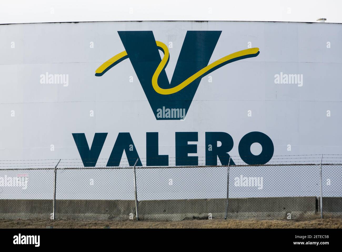 A logo sign outside of a facility occupied by the Valero Energy ...