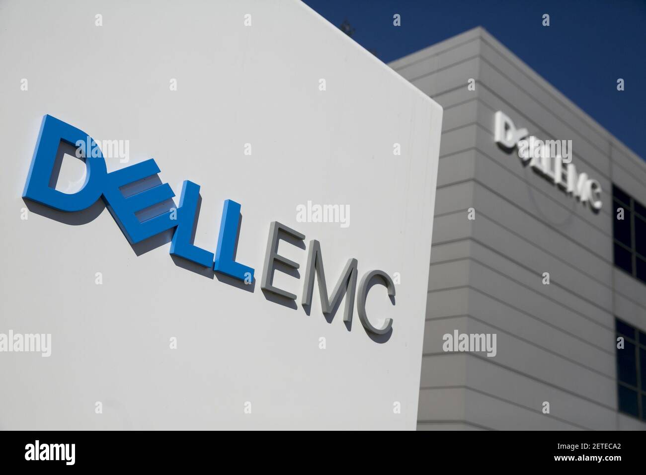 A logo sign outside of a facility occupied by Dell EMC in Round Rock ...