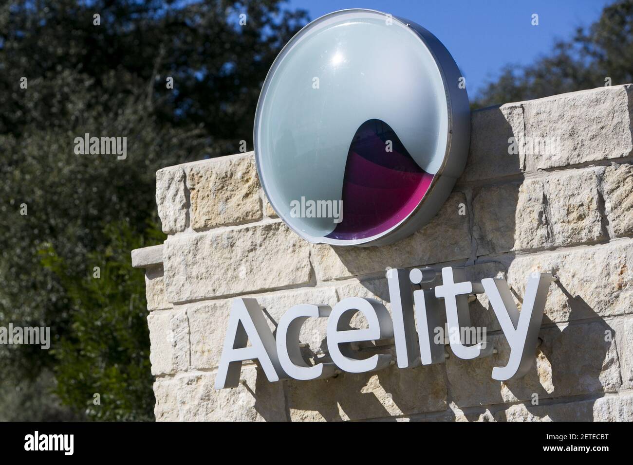 A logo sign outside of the headquarters of Acelity Holdings, Inc., in ...