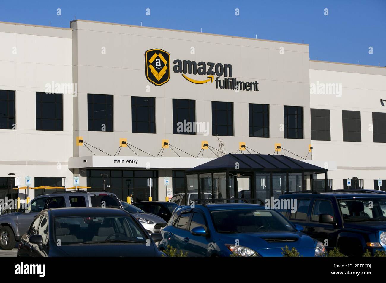A logo sign outside of a Amazon Fulfillment center in San Marcos, Texas ...