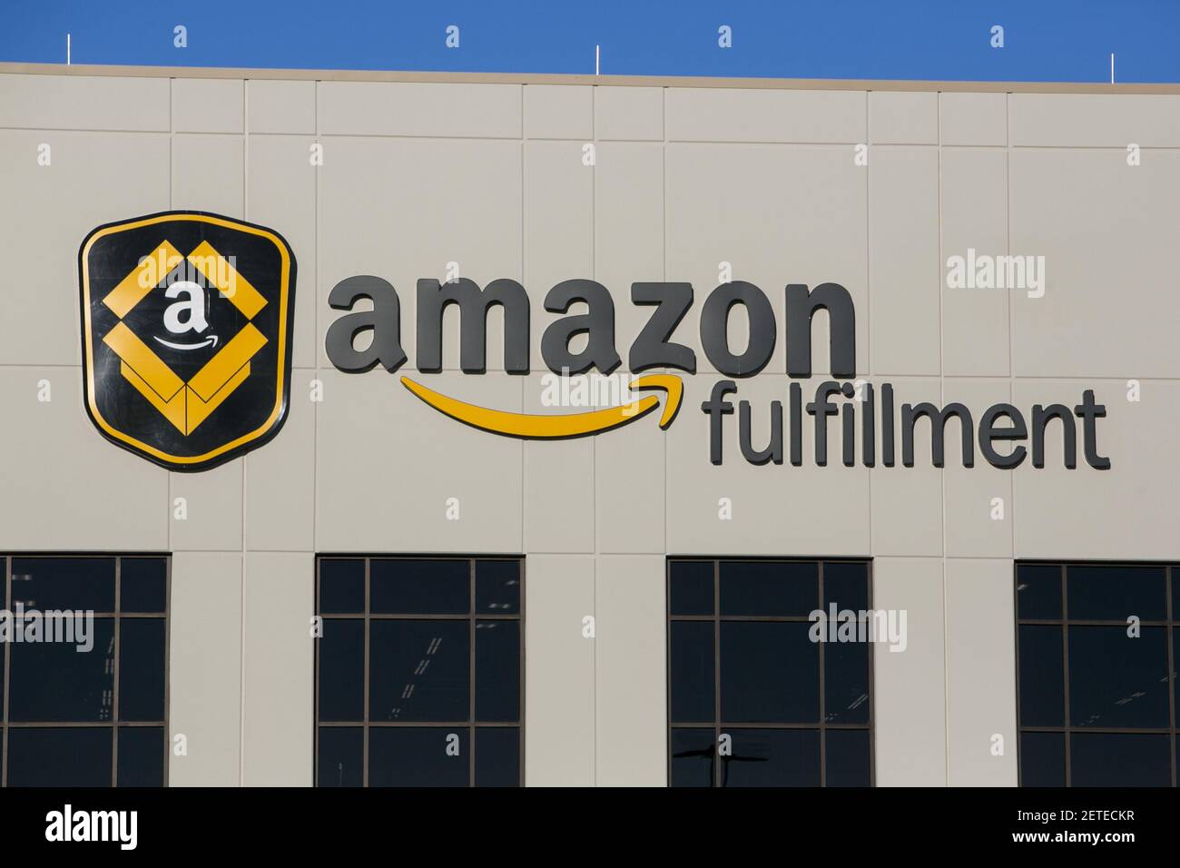 A logo sign outside of a Amazon Fulfillment center in San Marcos, Texas ...