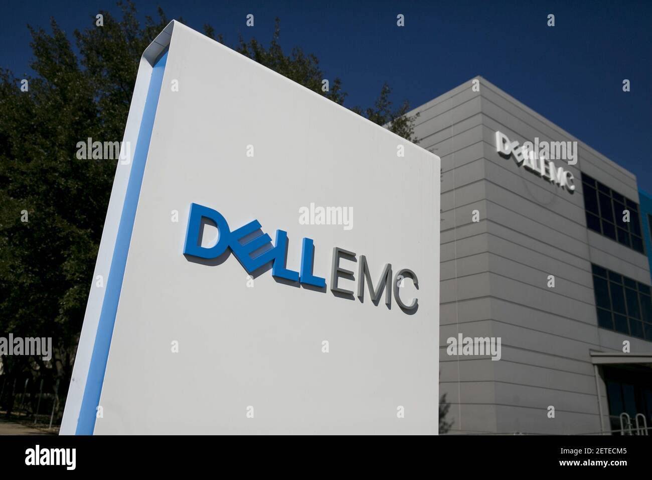 A logo sign outside of a facility occupied by Dell EMC in Round Rock ...