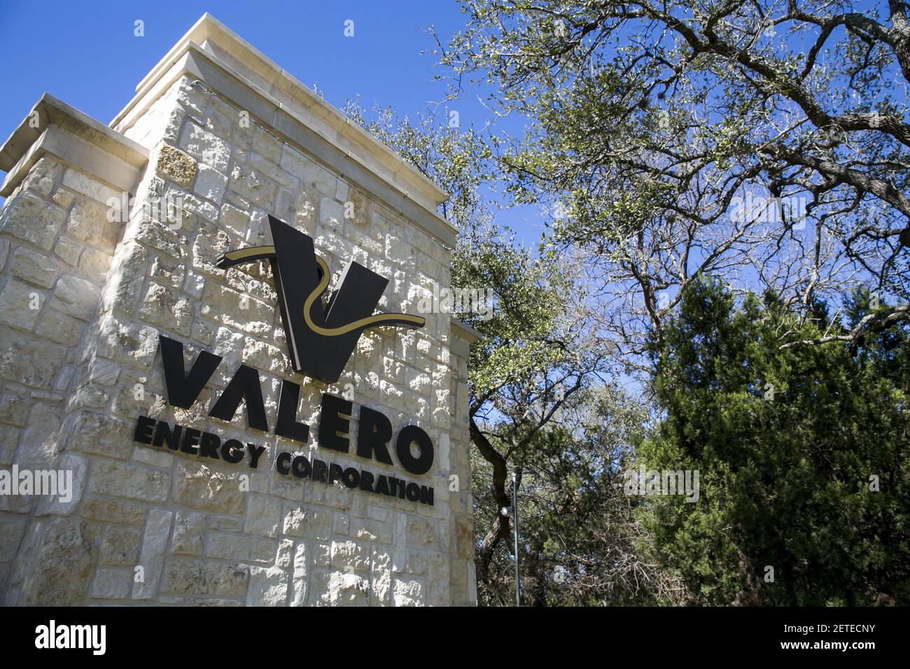 A logo sign outside of the headquarters of the Valero Energy ...