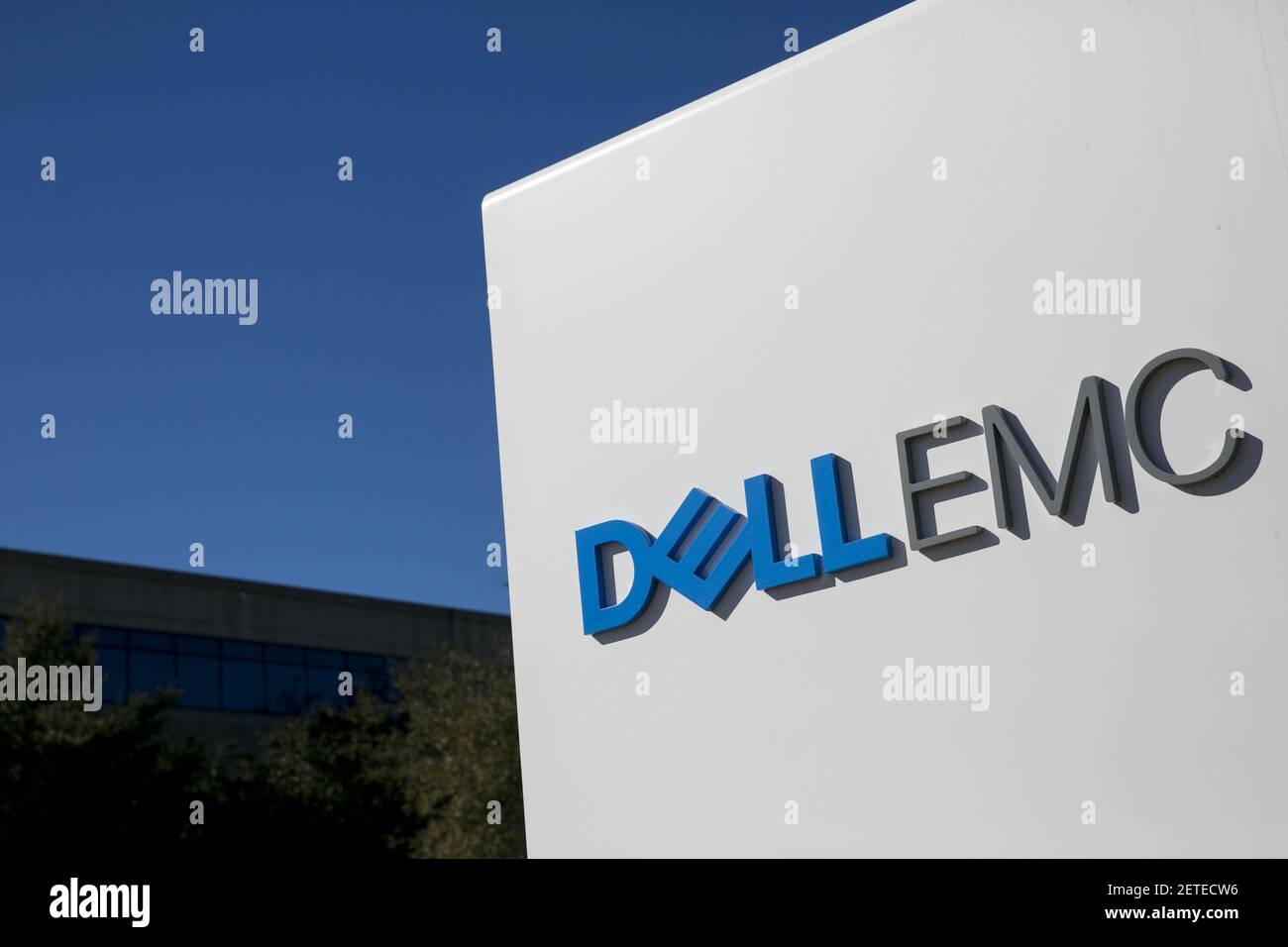 A logo sign outside of a facility occupied by Dell EMC in Round Rock ...