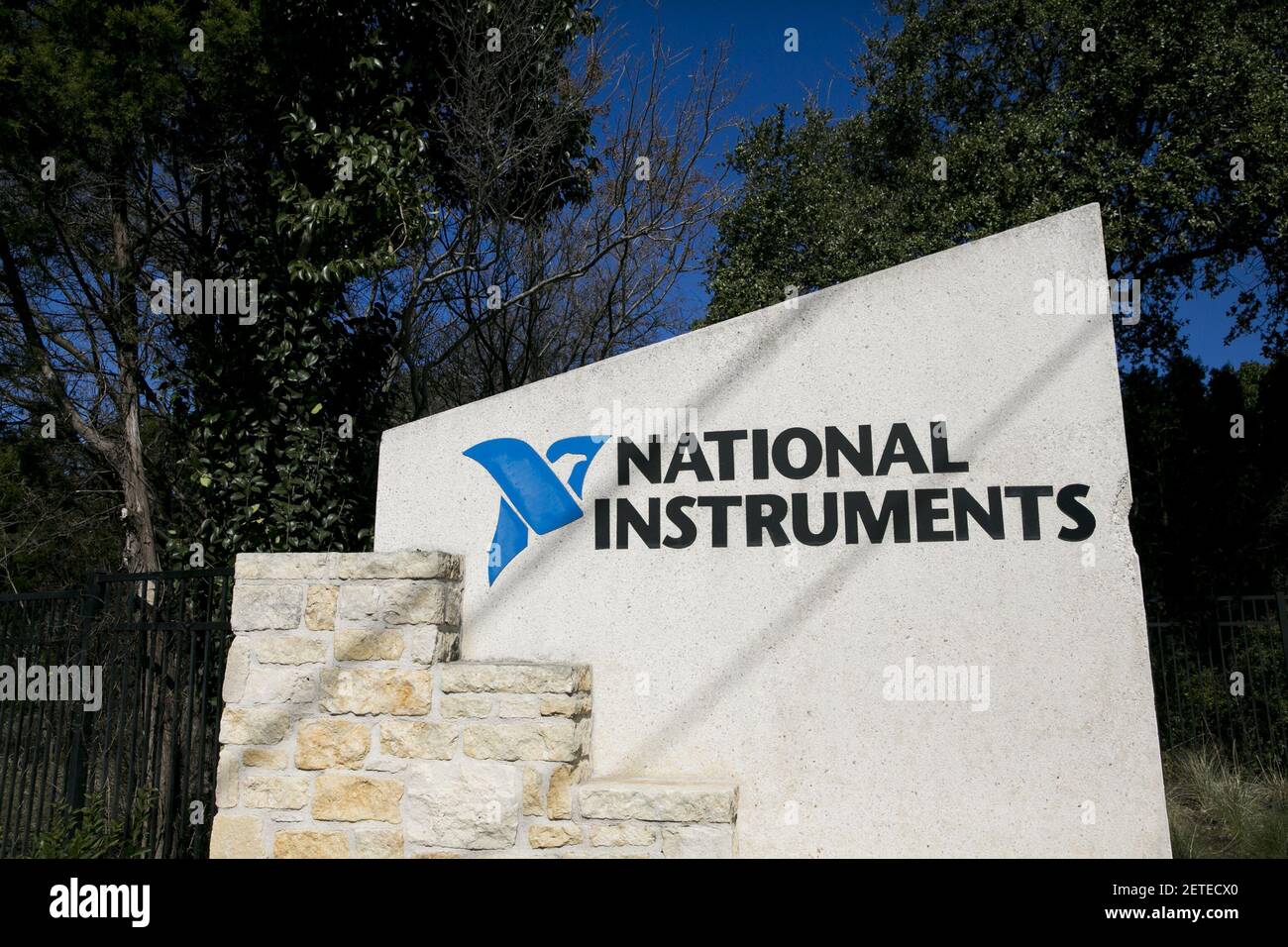 A logo sign outside of the headquarters of the National Instruments ...