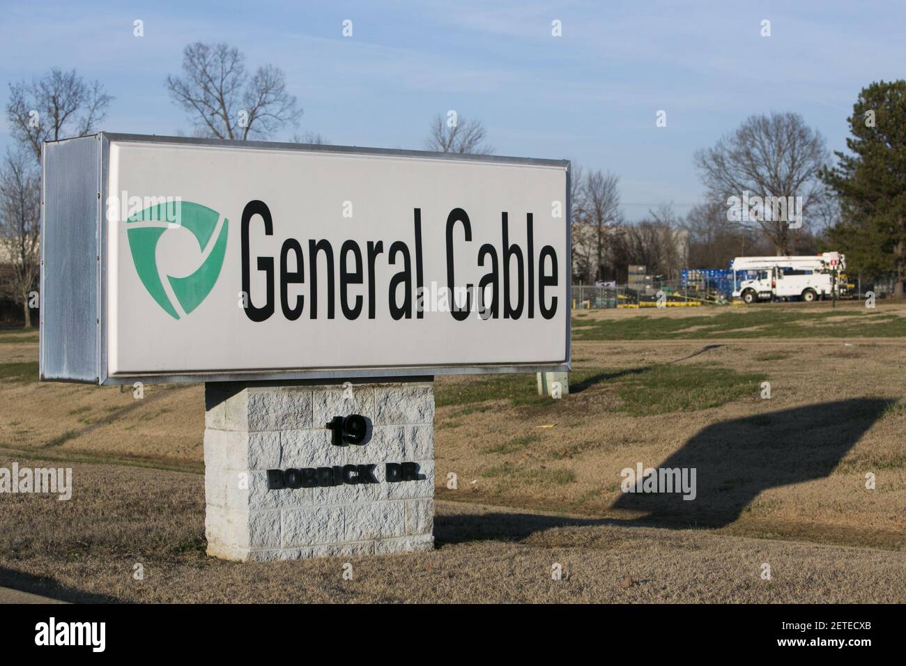 A logo sign outside of a facility occupied by General Cable in Jackson ...
