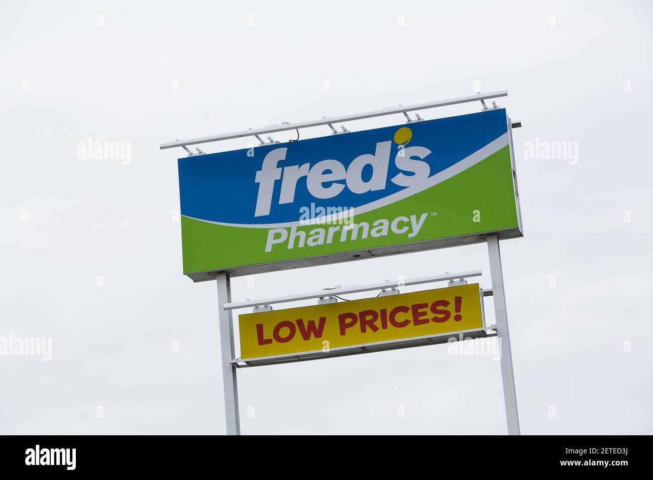 A logo sign outside of the headquarters of Fred's Pharmacy Memphis ...