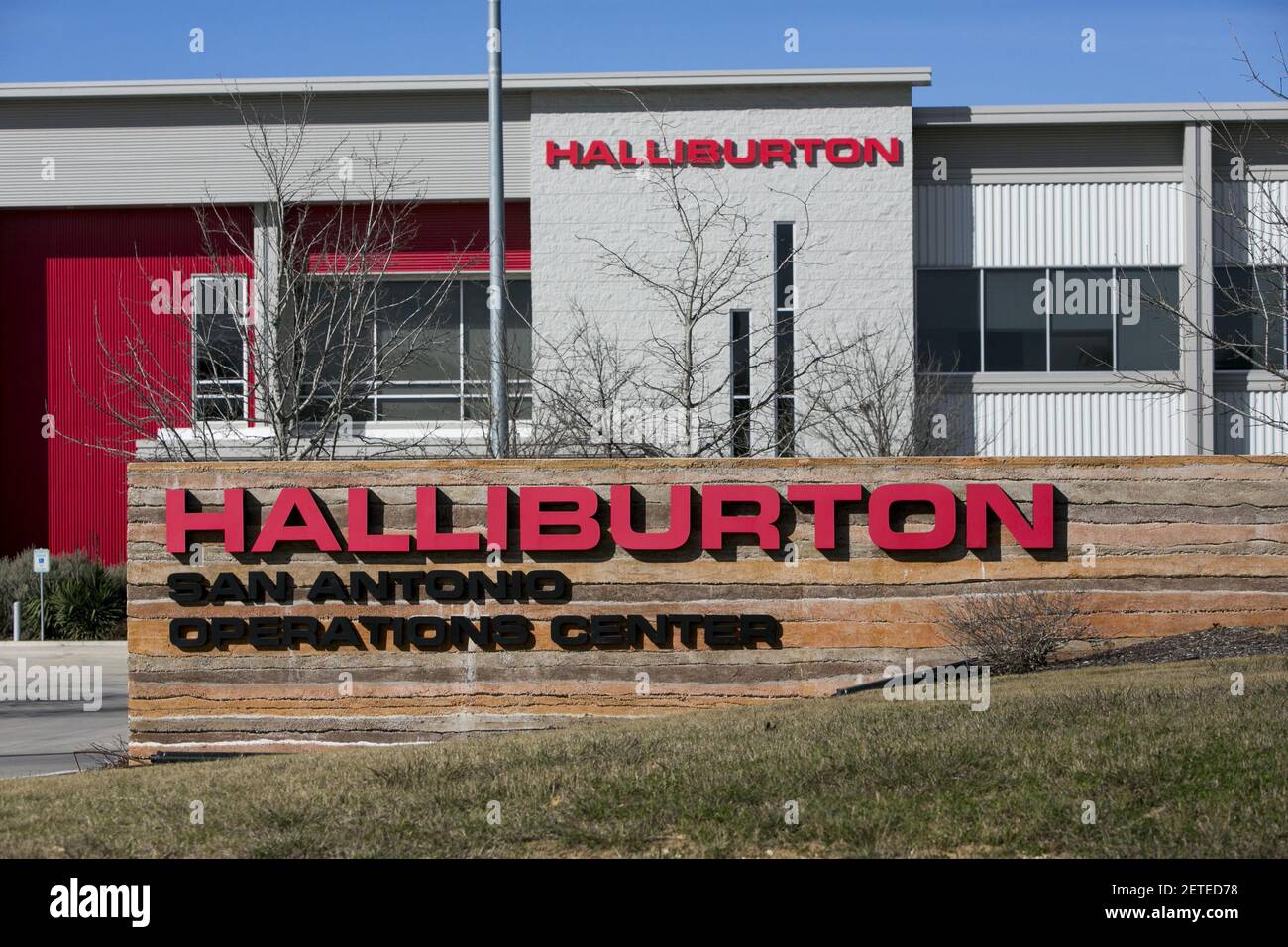 A logo sign outside of a facility occupied by Halliburton in Elmendorf ...