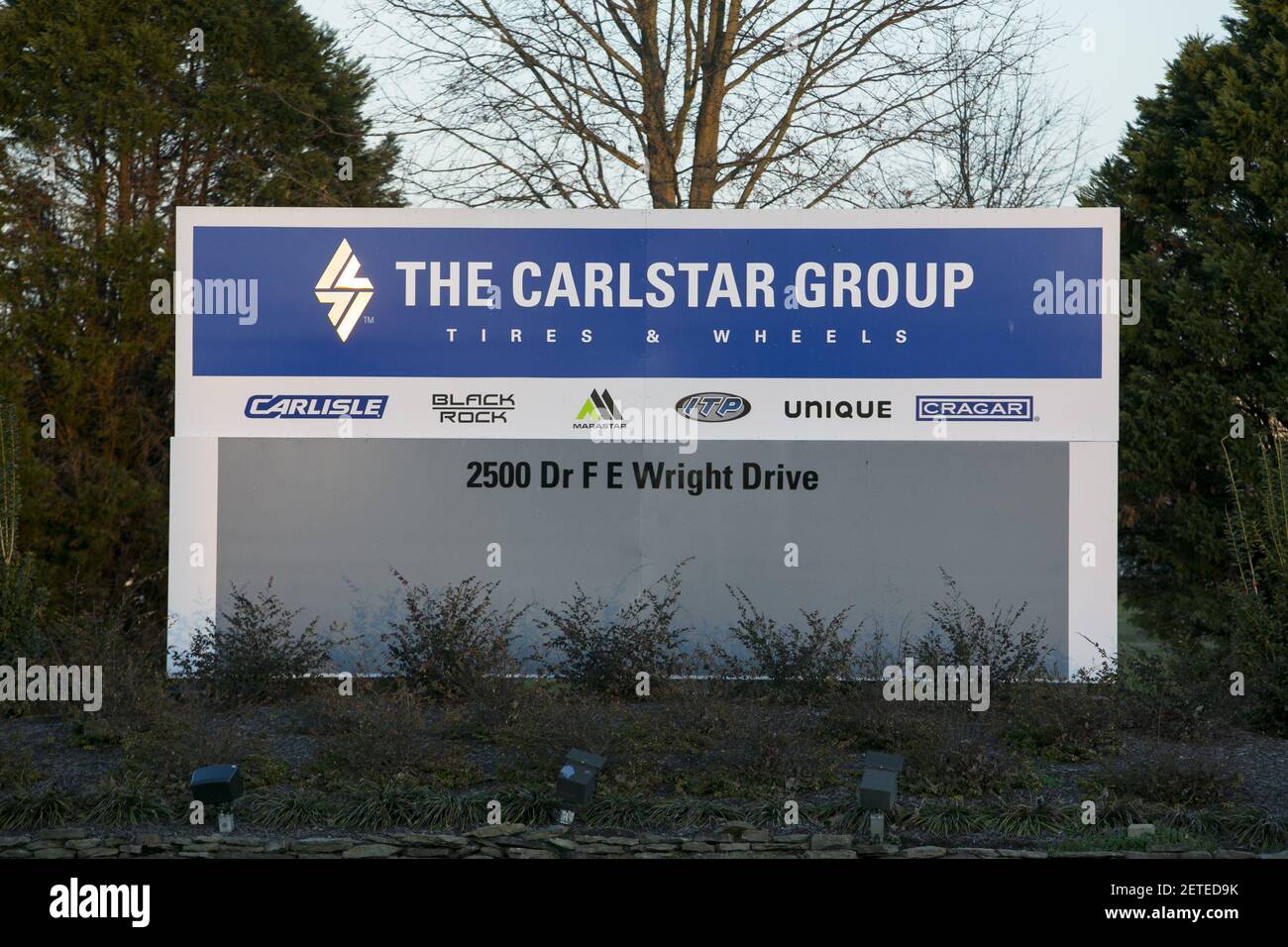 A logo sign outside of a facility occupied by The Carlstar Group in ...