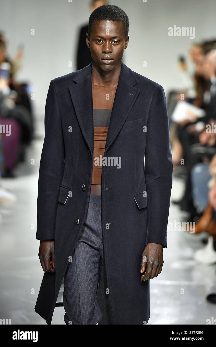 Model Alpha Dia walks on the runway during the Calvin Klein Fashion ...