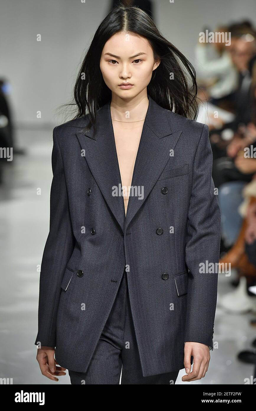 Model Cong He walks on the runway during the Calvin Klein Fashion Show ...