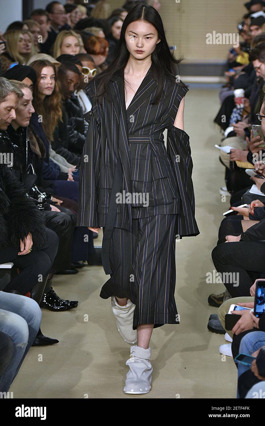 Model Cong He walks on the runway during the Public School Fashion Show ...