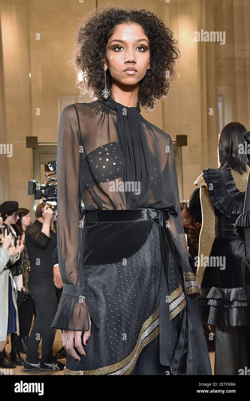 Model Aiden Curtiss walks on the stage during the Jill Stuart Fashion ...