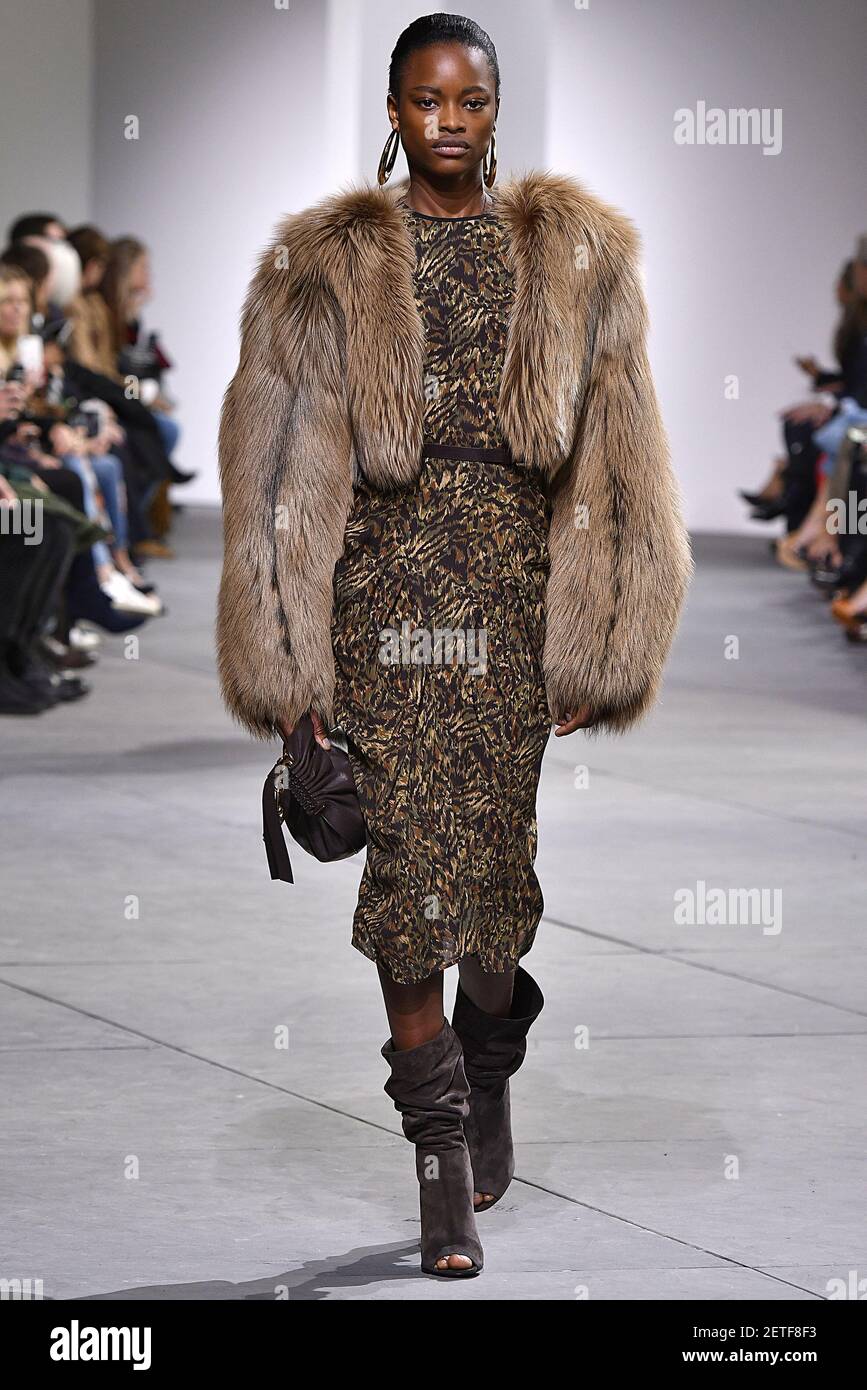 Model Mayowa Nicholas walks on the runway during the Michael Kors ...