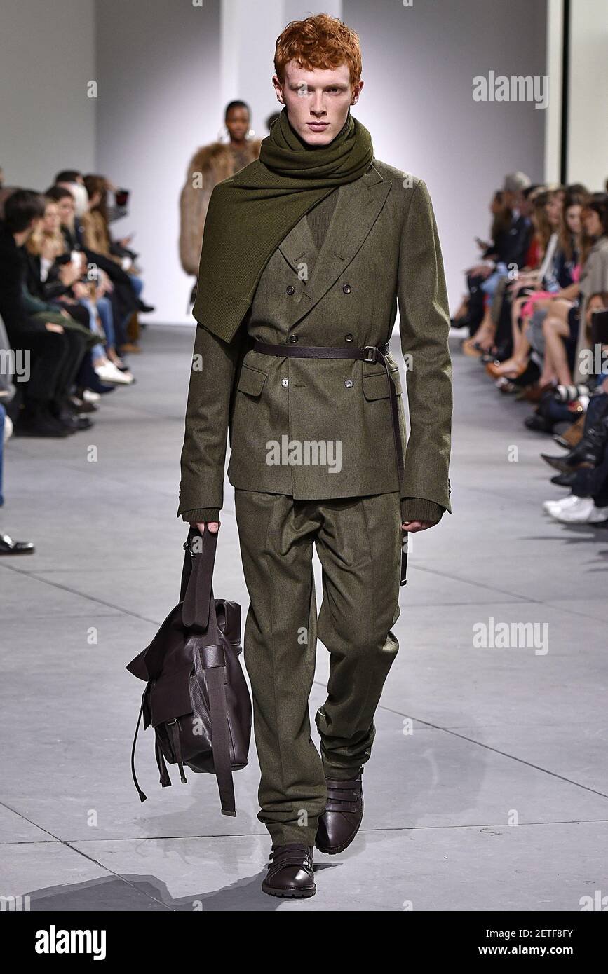Model Linus Wordemann walks on the runway during the Michael Kors ...