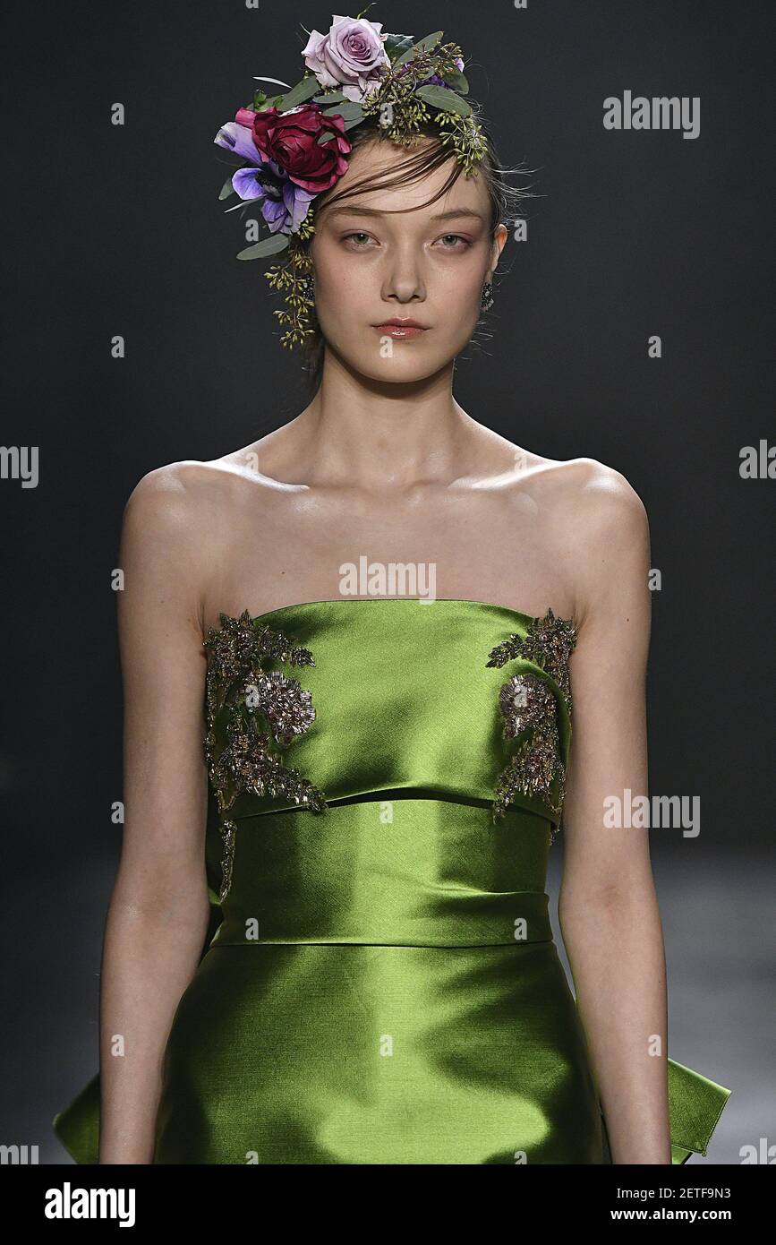 Model Yumi Lambert walks on the runway during the Marchesa Fashion Show ...