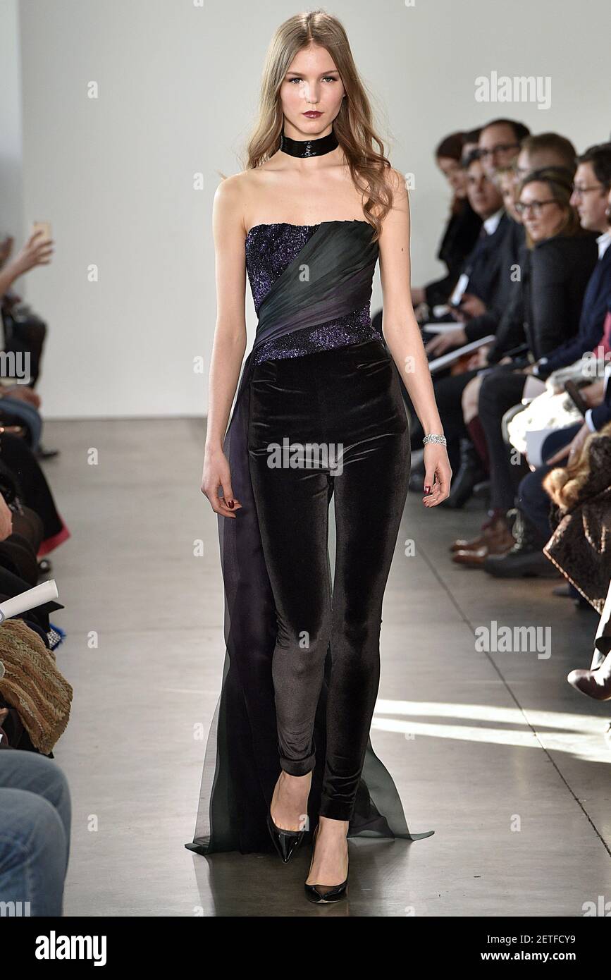 Model Paula Simkuse walks on the runway during the Pamella Roland ...