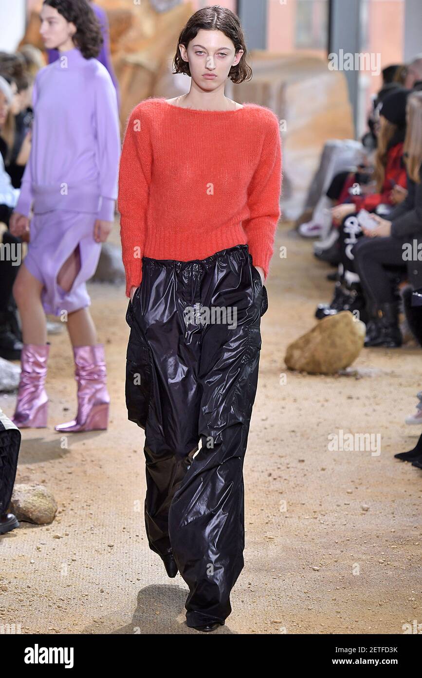 Model Amber Witcomb walks on the runway during the Lacoste Fashion Show ...
