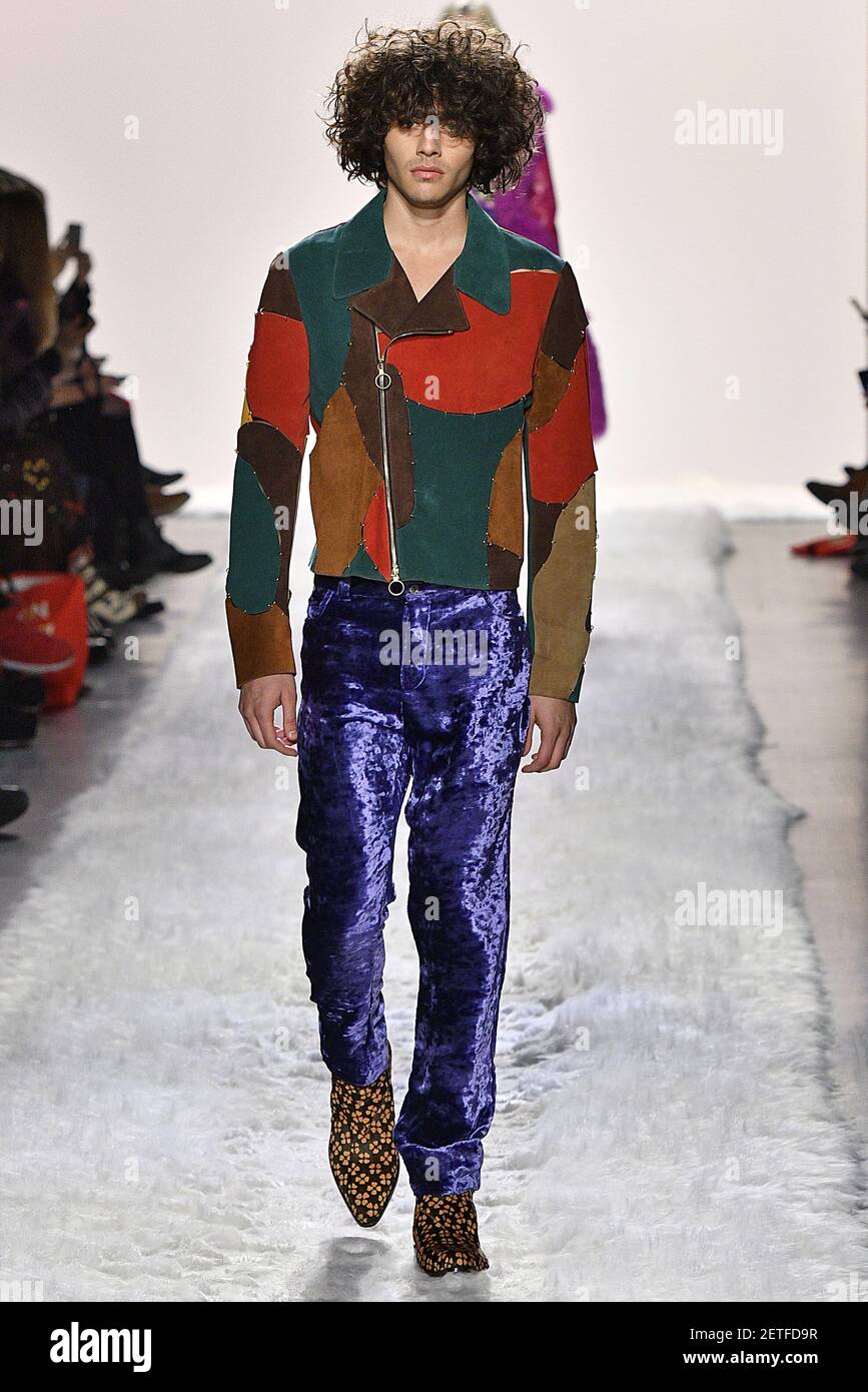 Model Francisco Perez walks on the runway during the Jeremy Scott ...