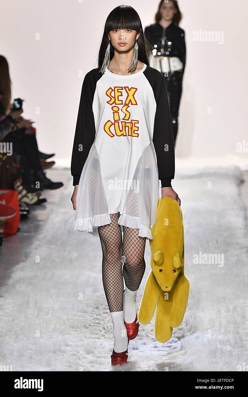 Model Huan Zhou walks on the runway during the Jeremy Scott Fashion ...